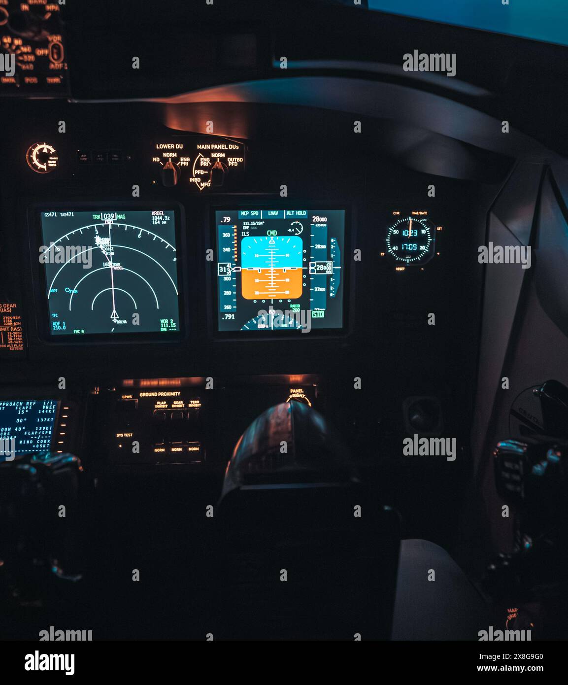 Cockpit view of an airplane during a night-time flight with illuminated ...