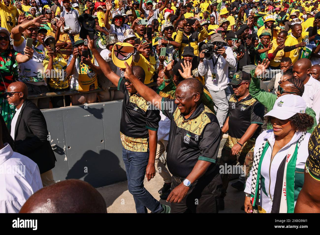President Cyril Ramaphosa greets the crowd at FNB stadium during the ...