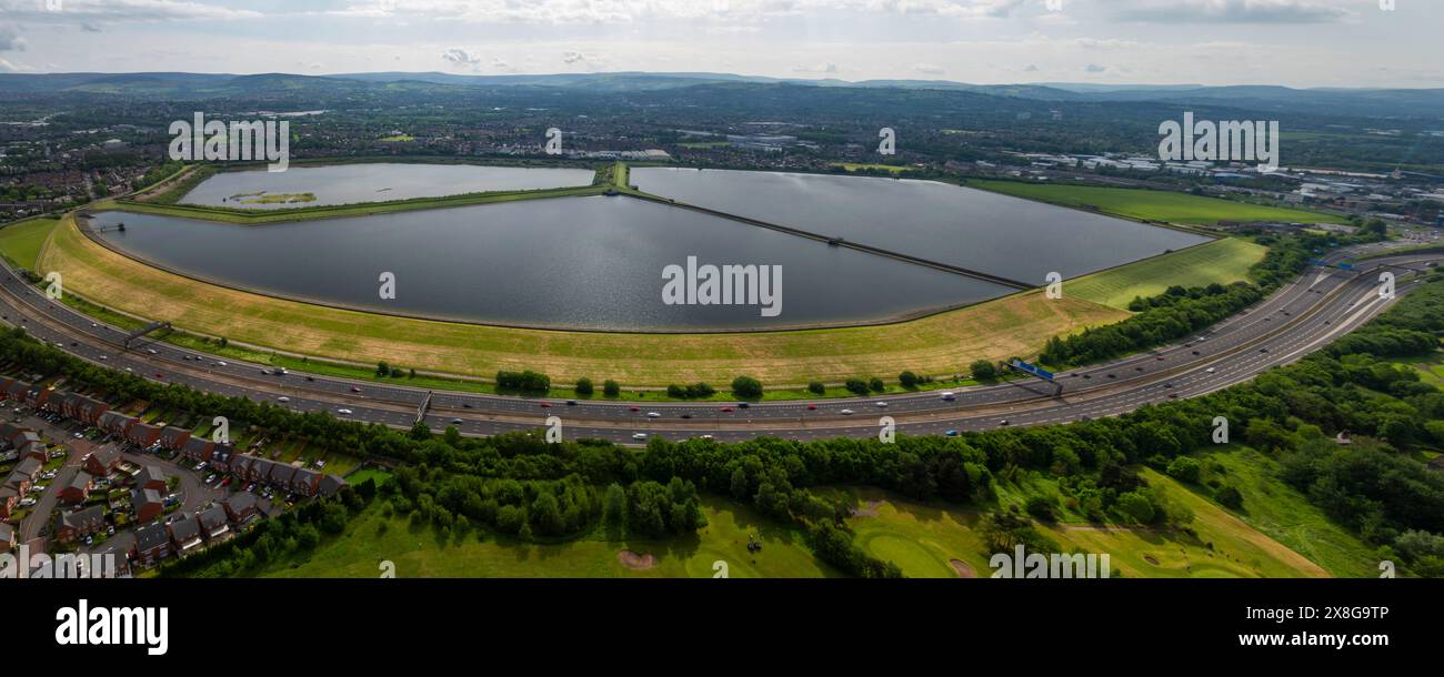 Aerial image of Audenshaw reservoirs and M60 Manchester outer ring road ...