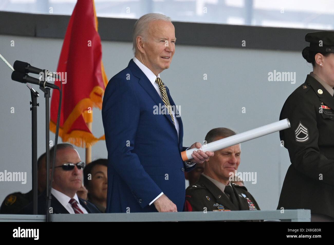 New York, USA. 25th May, 2024. U.S. President Joe Biden holds a diploma ...