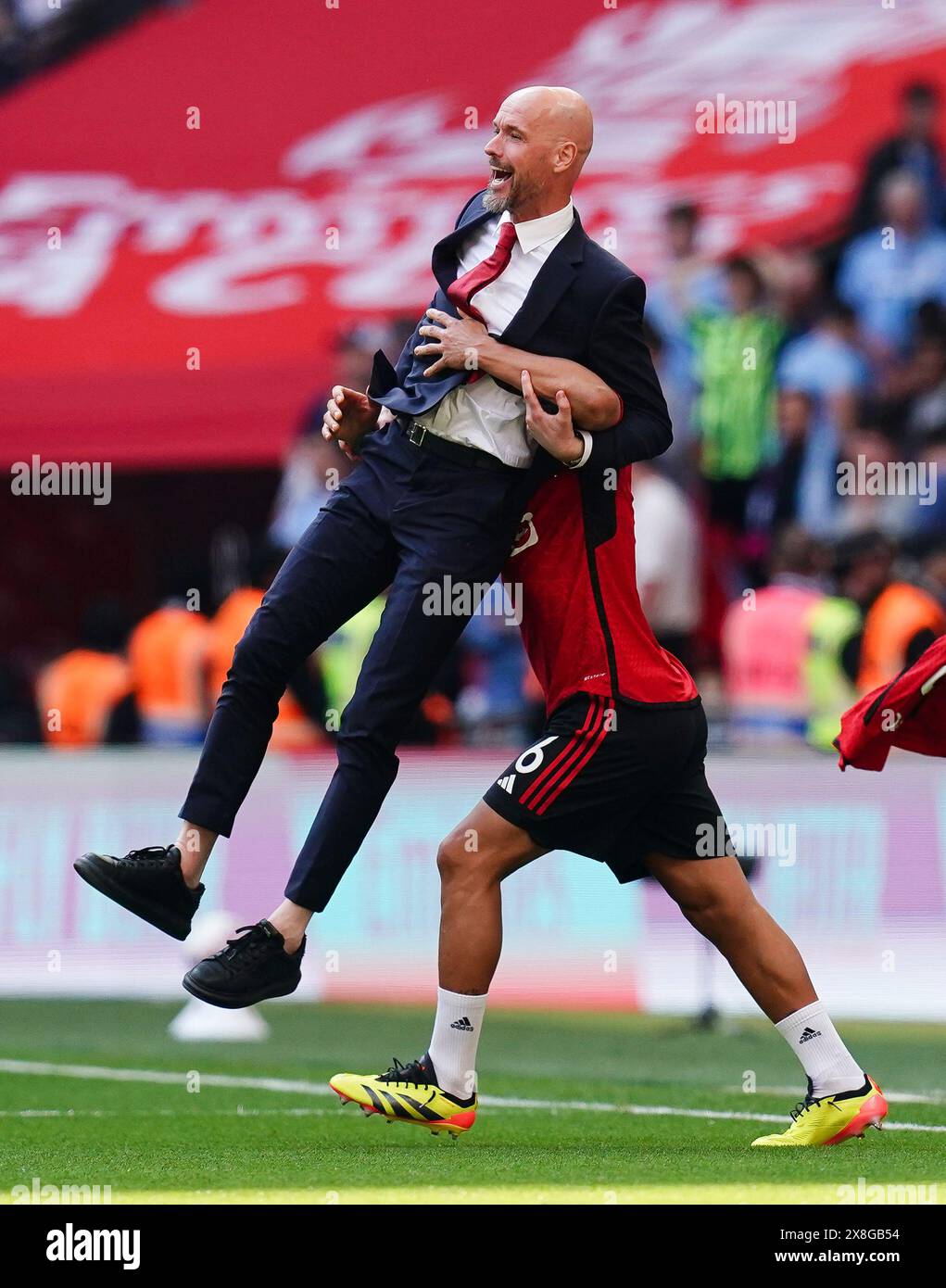 Manchester United Manager Erik Ten Hag Celebrates With Lisandro