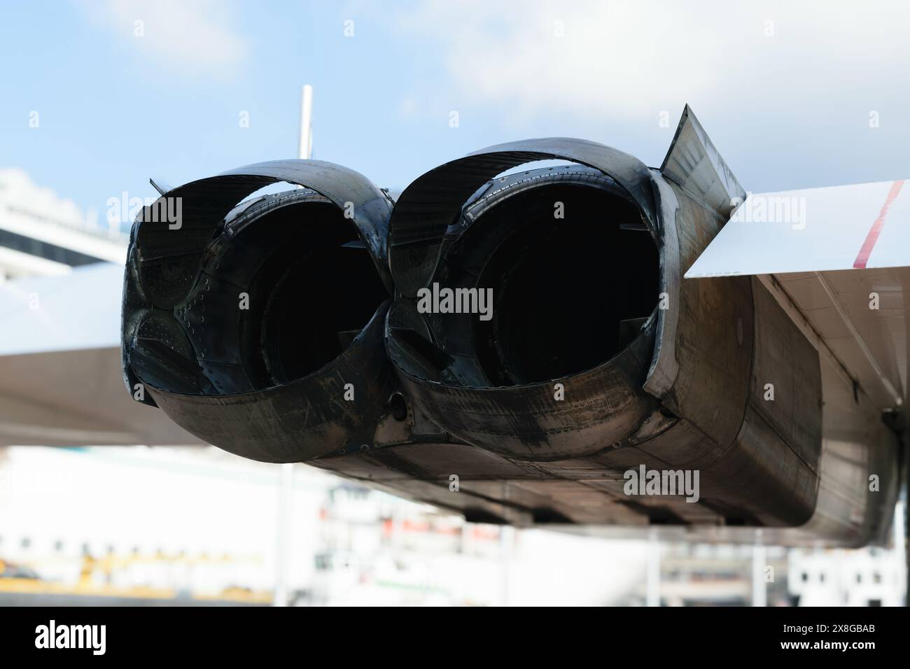 Close-up of the twin jet engines of an aircraft, showing the exhaust ...