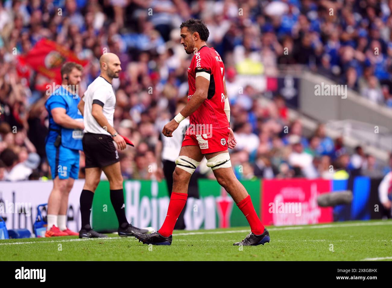 Stade Toulousain's Richie Arnold leaves the pitch after being shown a ...