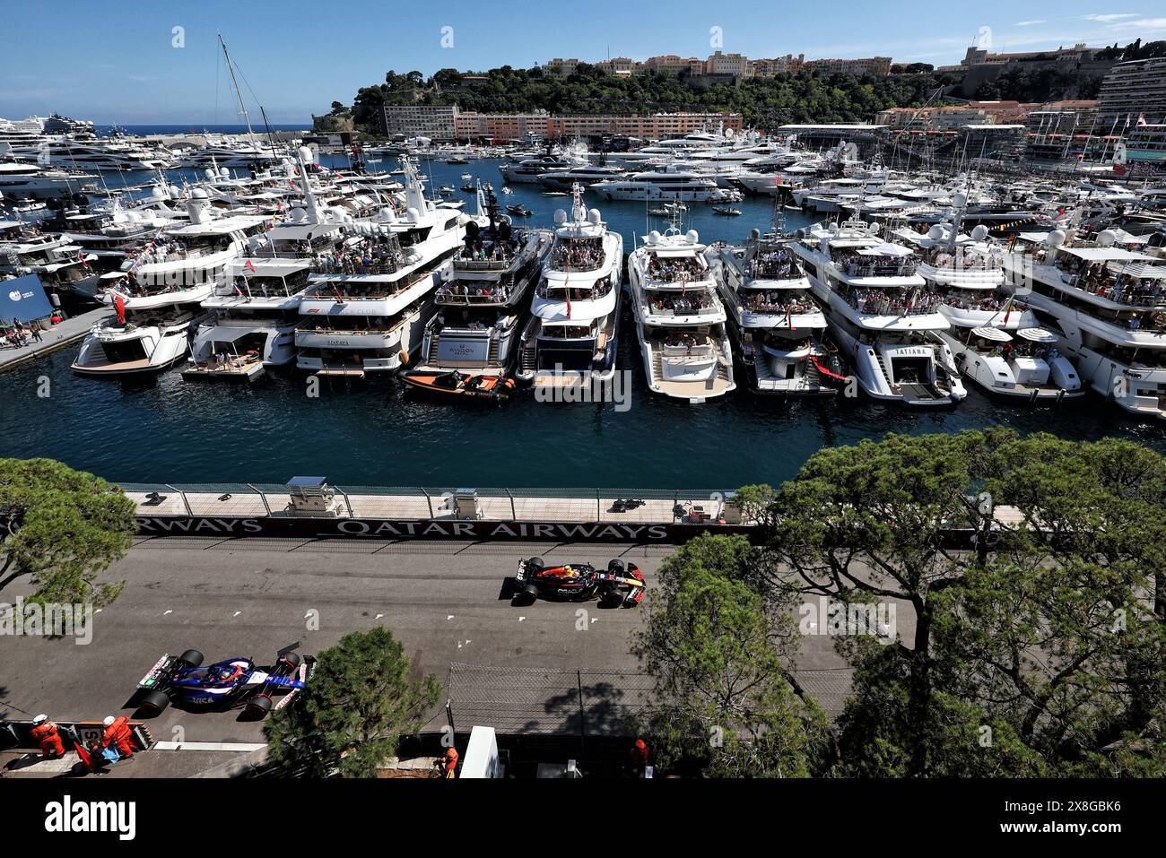 Monte Carlo, Monaco. 25th May, 2024. Sergio Perez (MEX) Red Bull Racing RB20 and Daniel ...
