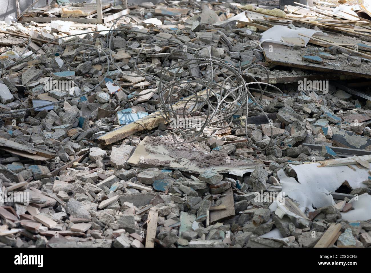 Construction waste. A pile of concrete debris with reinforcement ...