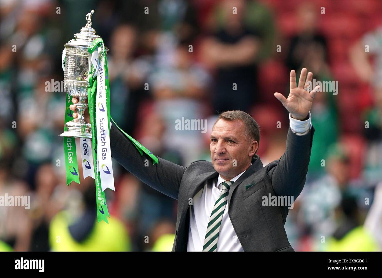 Celtic manager Brendan Rodgers lifts the trophy following the Scottish ...