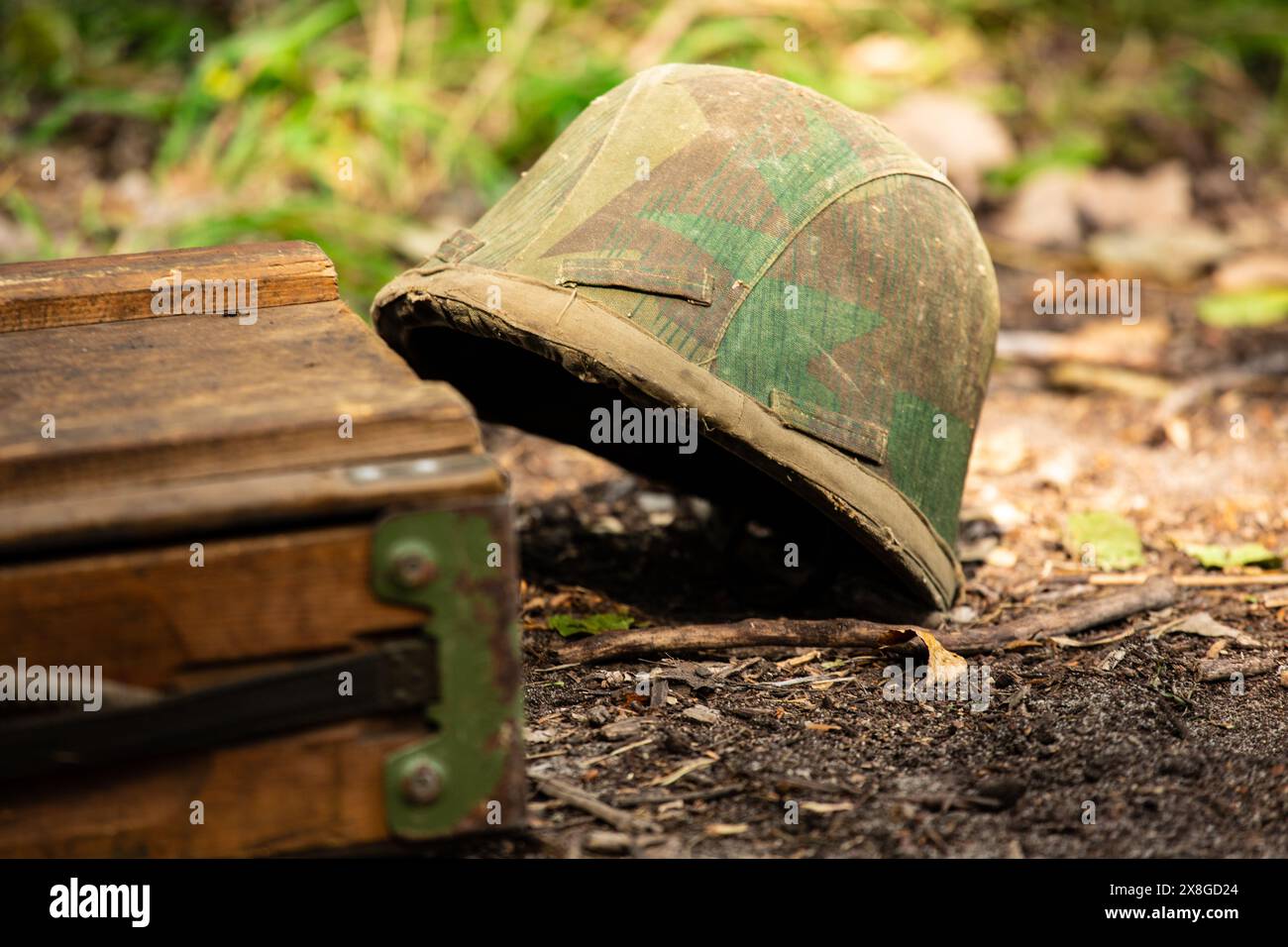 WWII german helmet on the ground. Wehrmacht m35 ( stahlhelm ) helmet in ...