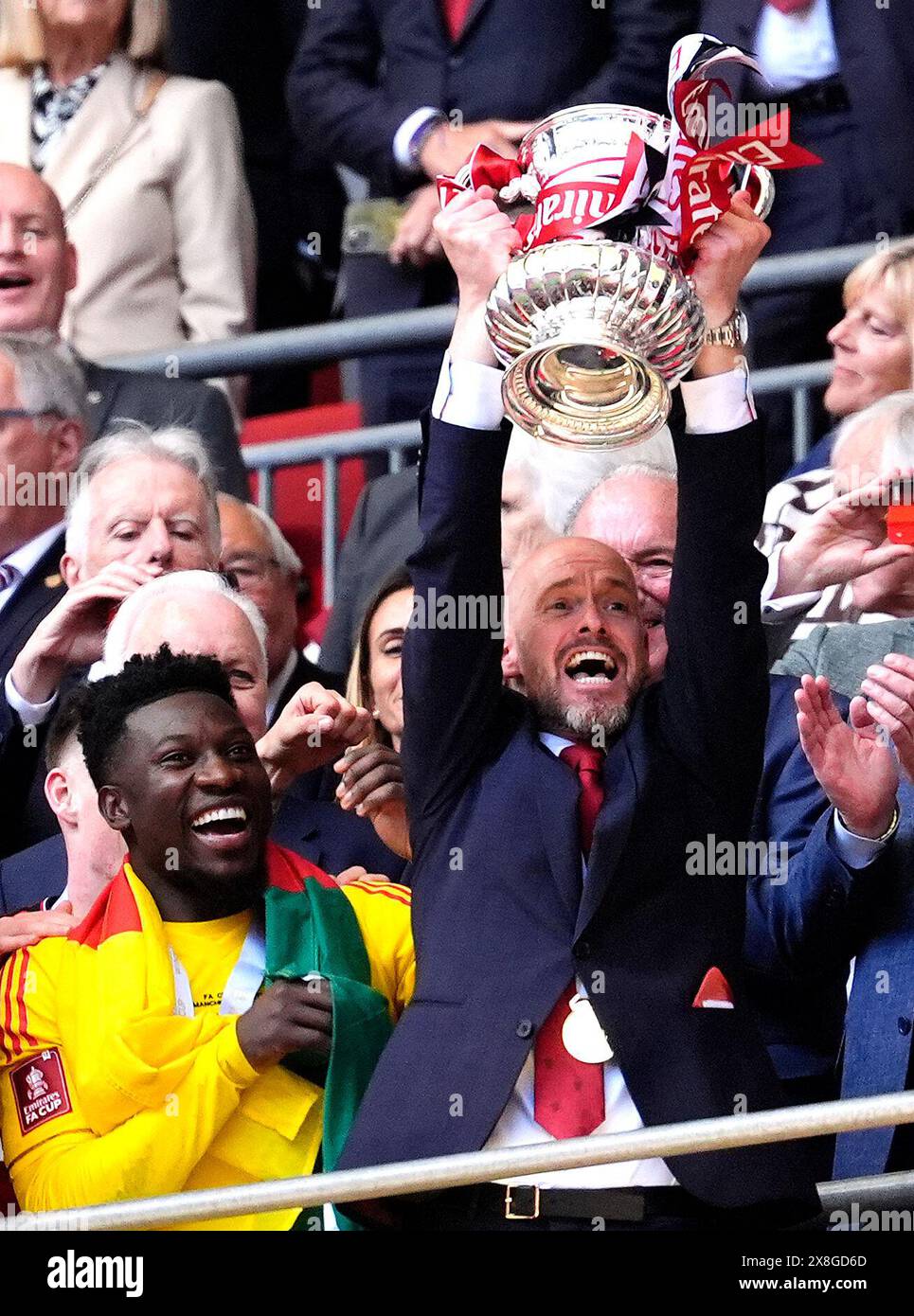 Manchester United manager Erik ten Hag celebrates with the trophy after ...