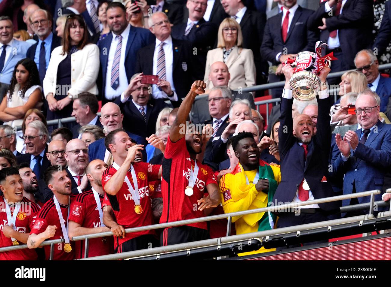 Manchester United manager Erik ten Hag celebrates with the trophy after ...