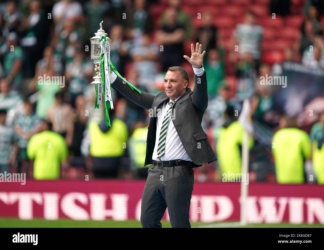 Celtic manager Brendan Rodgers lifts the trophy following the Scottish ...