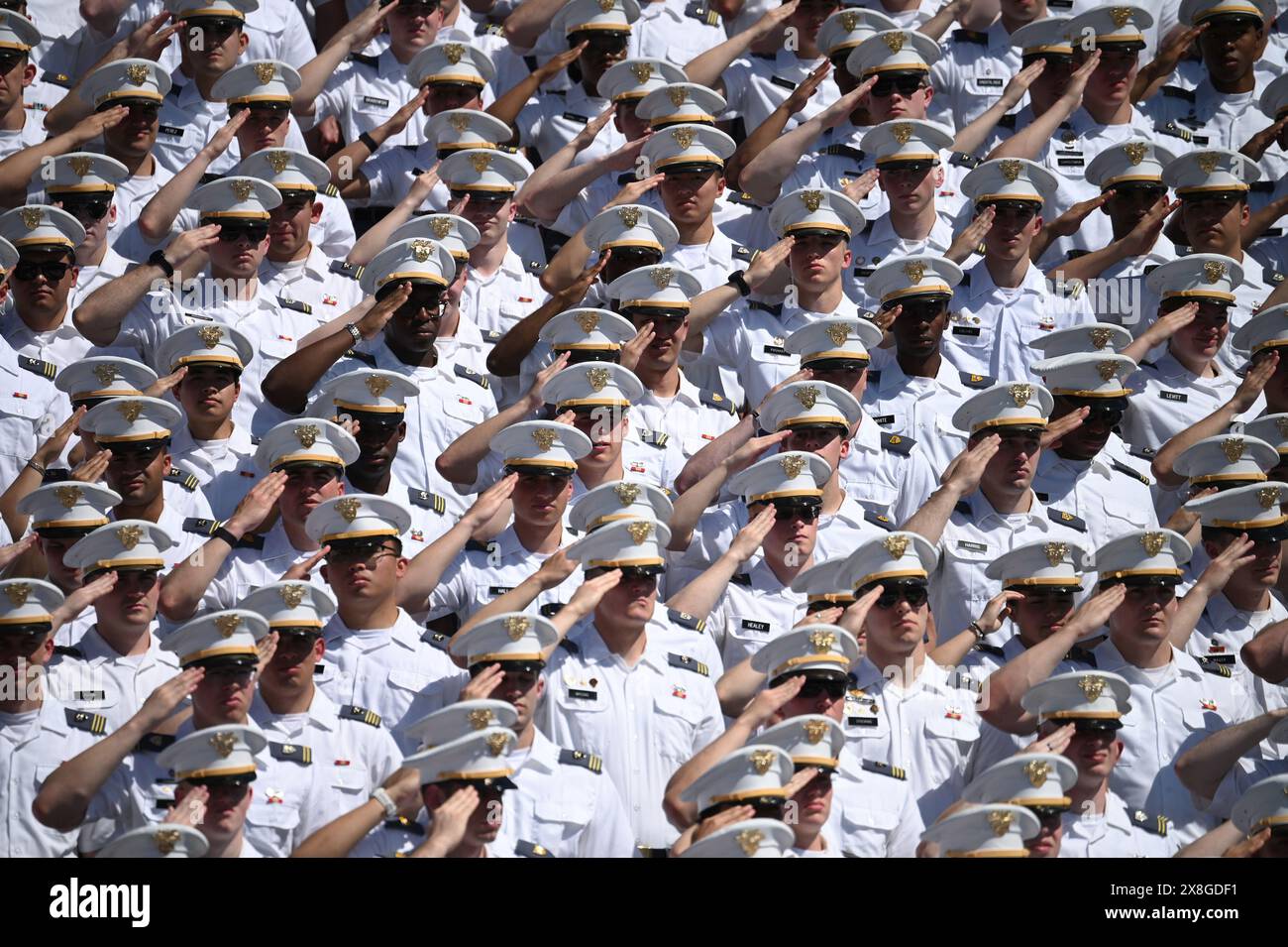New York, USA. 25th May, 2024. Underclassmen salute as they attend the ...