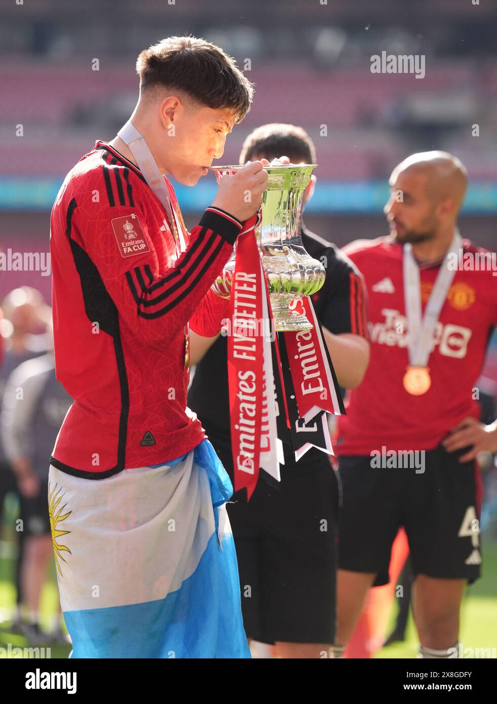 Manchester united's alejandro garnacho celebrates with the fa cup ...