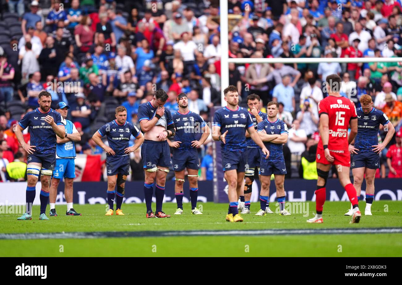 Leinster Rugby players look dejected following defeat in the Investec ...