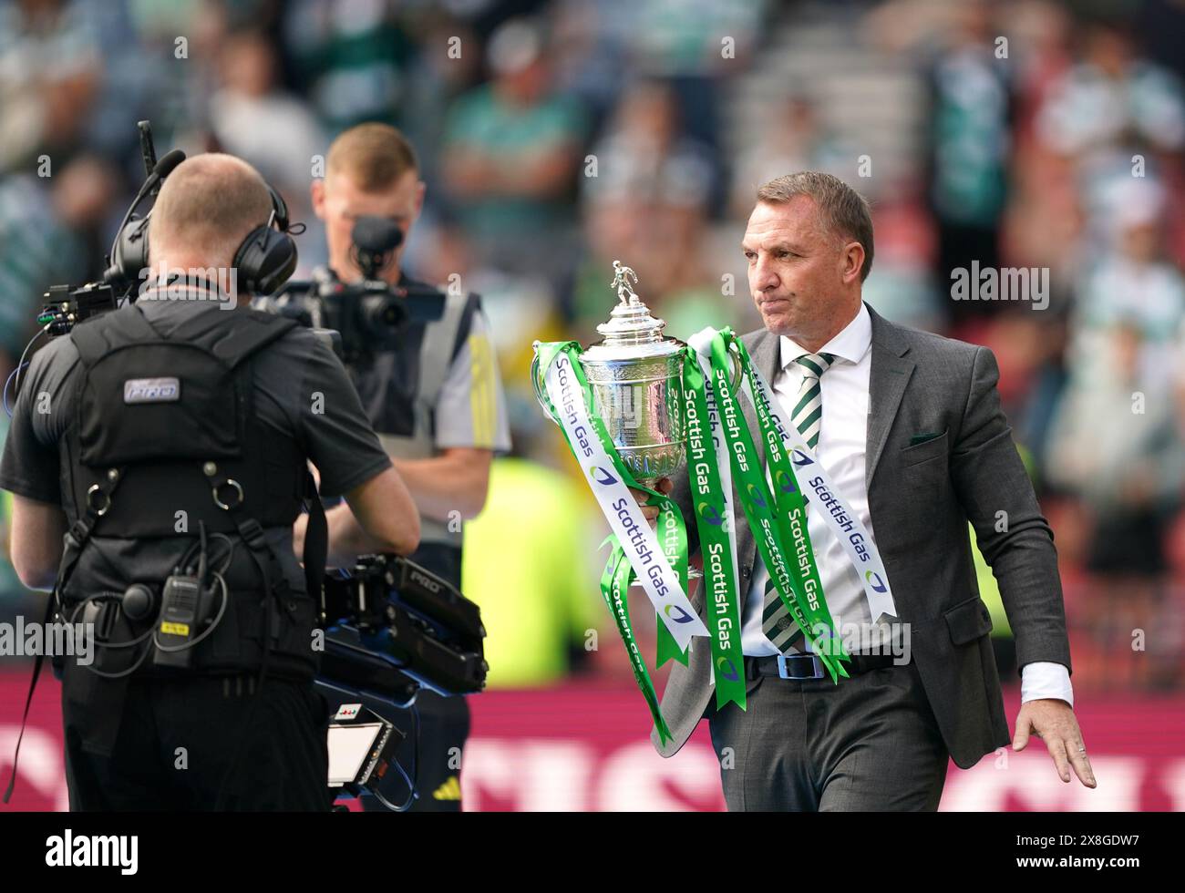 Celtic manager Brendan Rodgers lifts the trophy following the Scottish ...