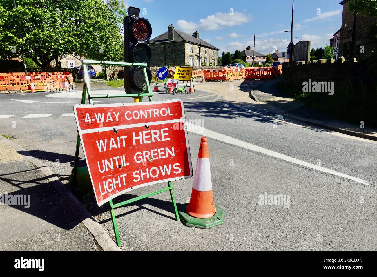 Road works in New Mills, Derbyshire, for replaying old gas pipes with ...