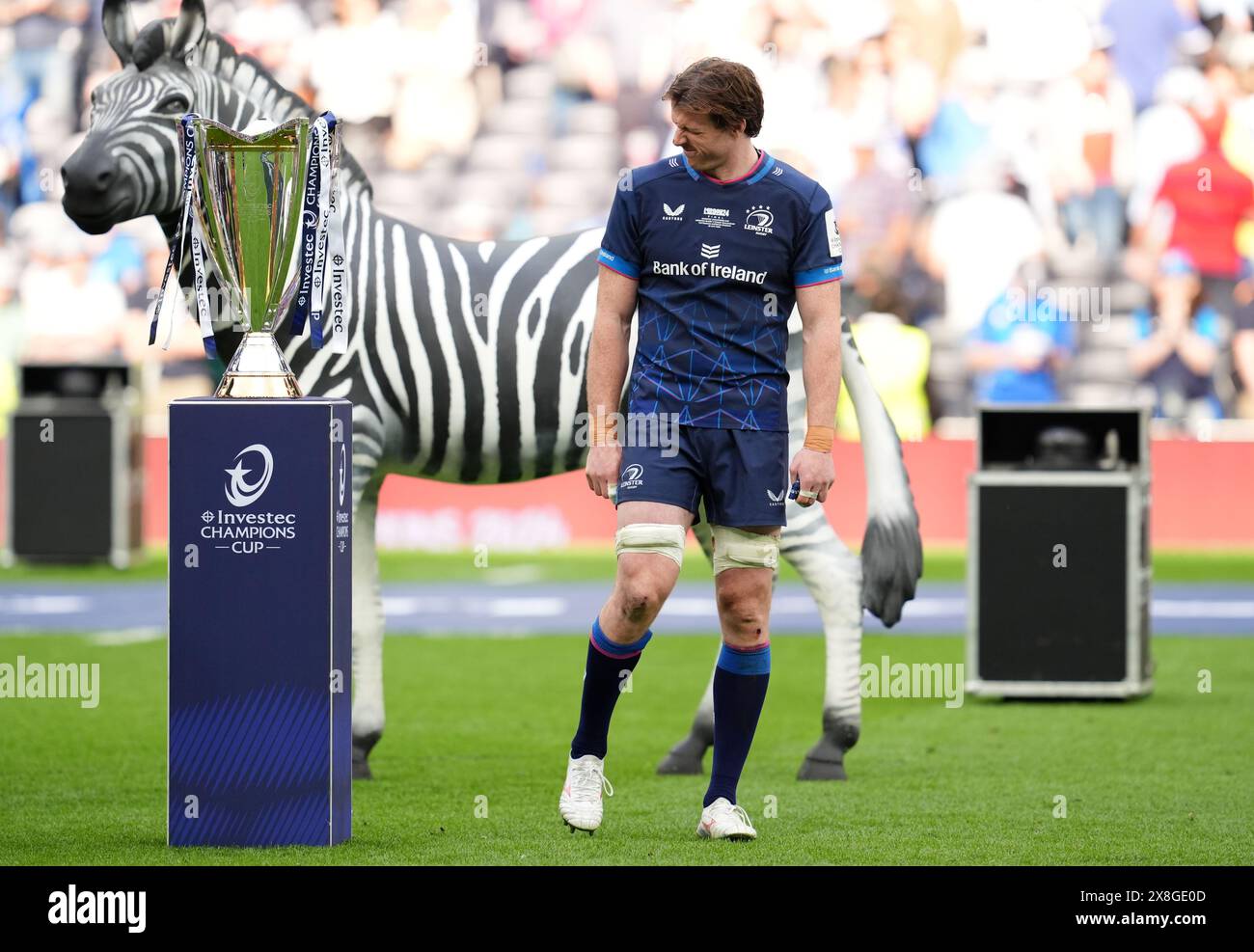 Leinster's Ryan Baird walks past the trophy following the Investec ...