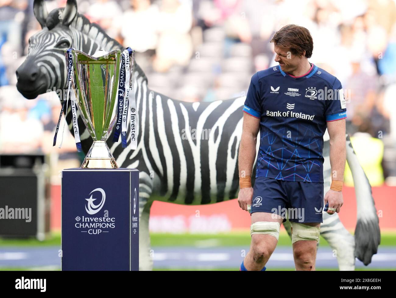 Leinster's Ryan Baird walks past the trophy following the Investec ...