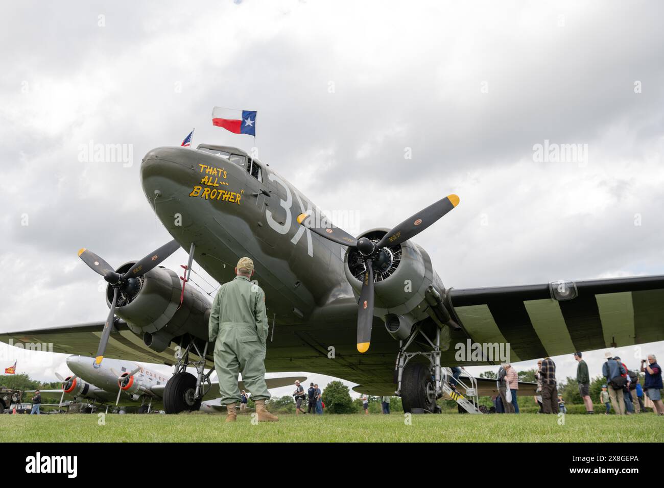 C-47 ‘That’s All, Brother’ ground crew takes in the atmosphere during ...