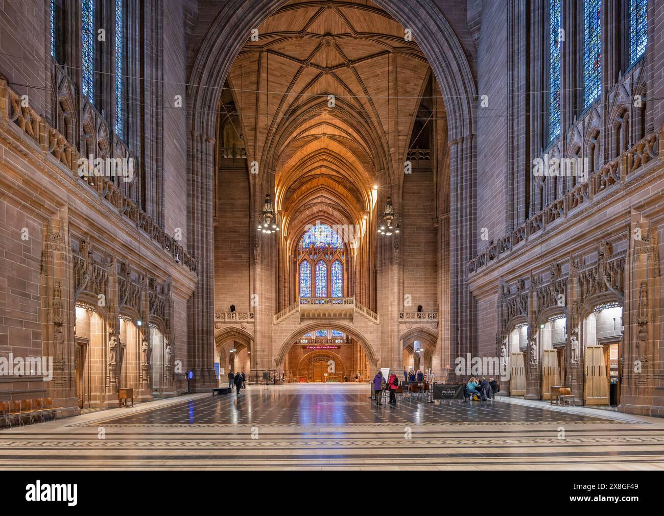 Interior view of the central space and nave and large stained glass ...
