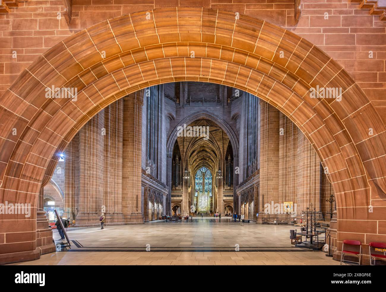 Arched view of the central space and nave and stained glass windows of ...