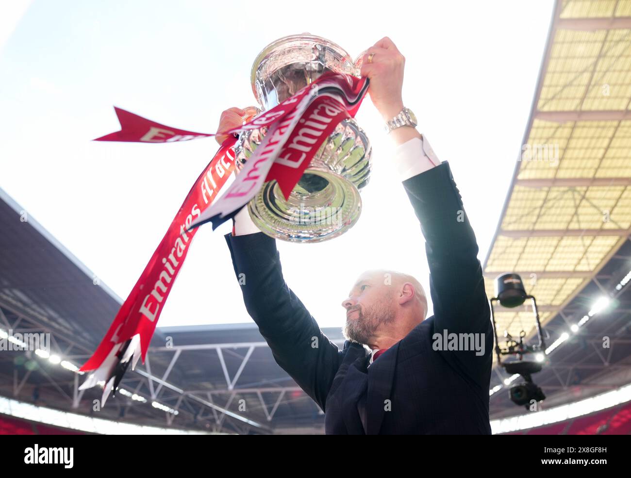 Manchester United manager Erik ten Hag celebrates with the FA Cup ...