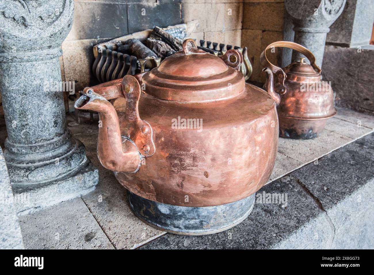 Large copper kettles in a magnificent fireplace area at the Kvitnes ...