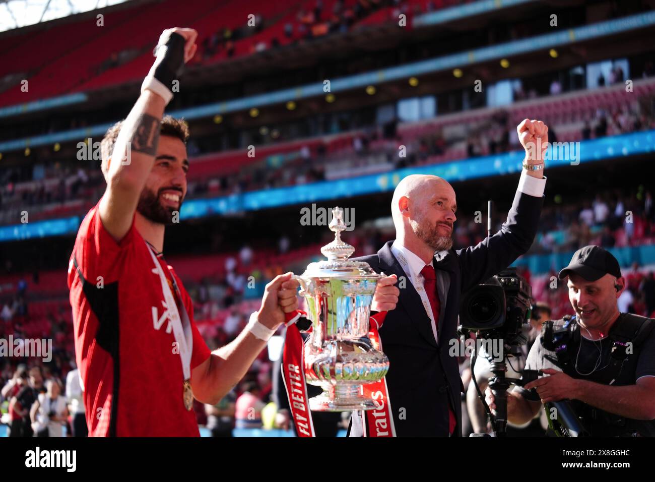 Manchester United's Bruno Fernandes and manager Erik ten Hag with the ...