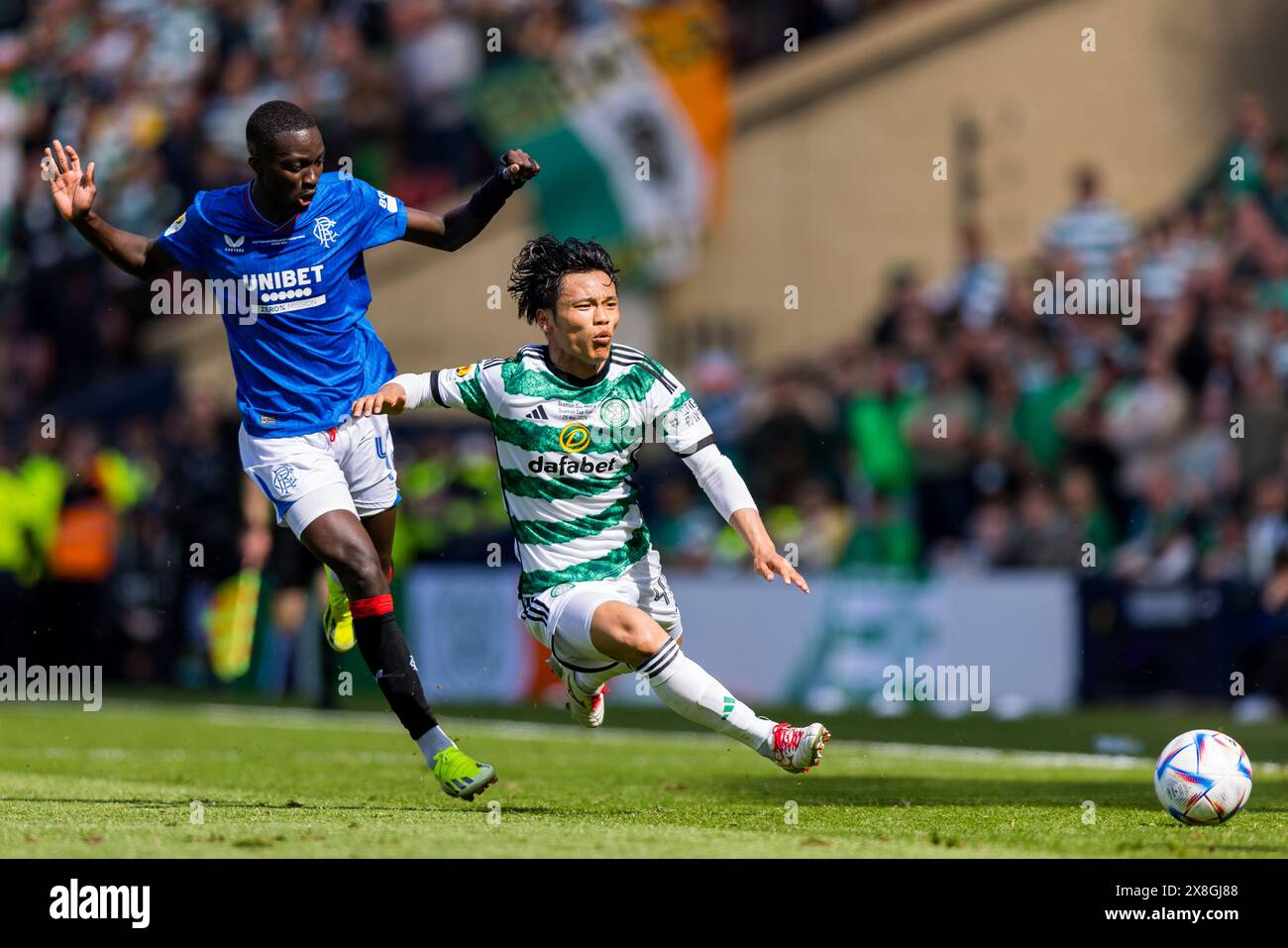 Glasgow, Scotland. 25 May 2024. Mohamed Diomande (42 - Rangers) fouls ...