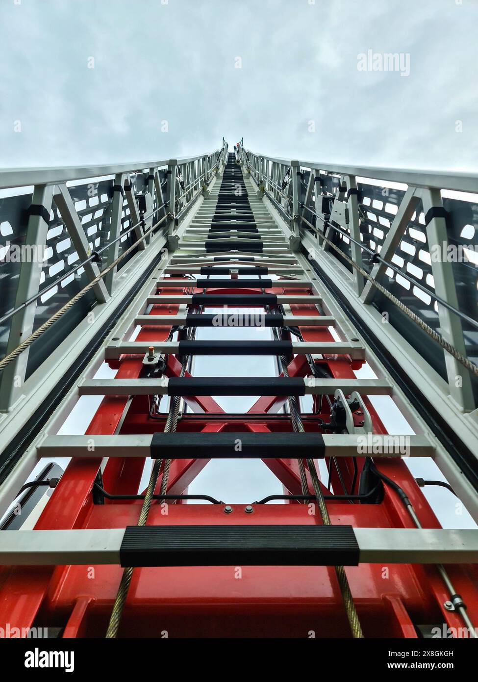 A very long extended ladder for rescuing people on a fire engine Stock ...