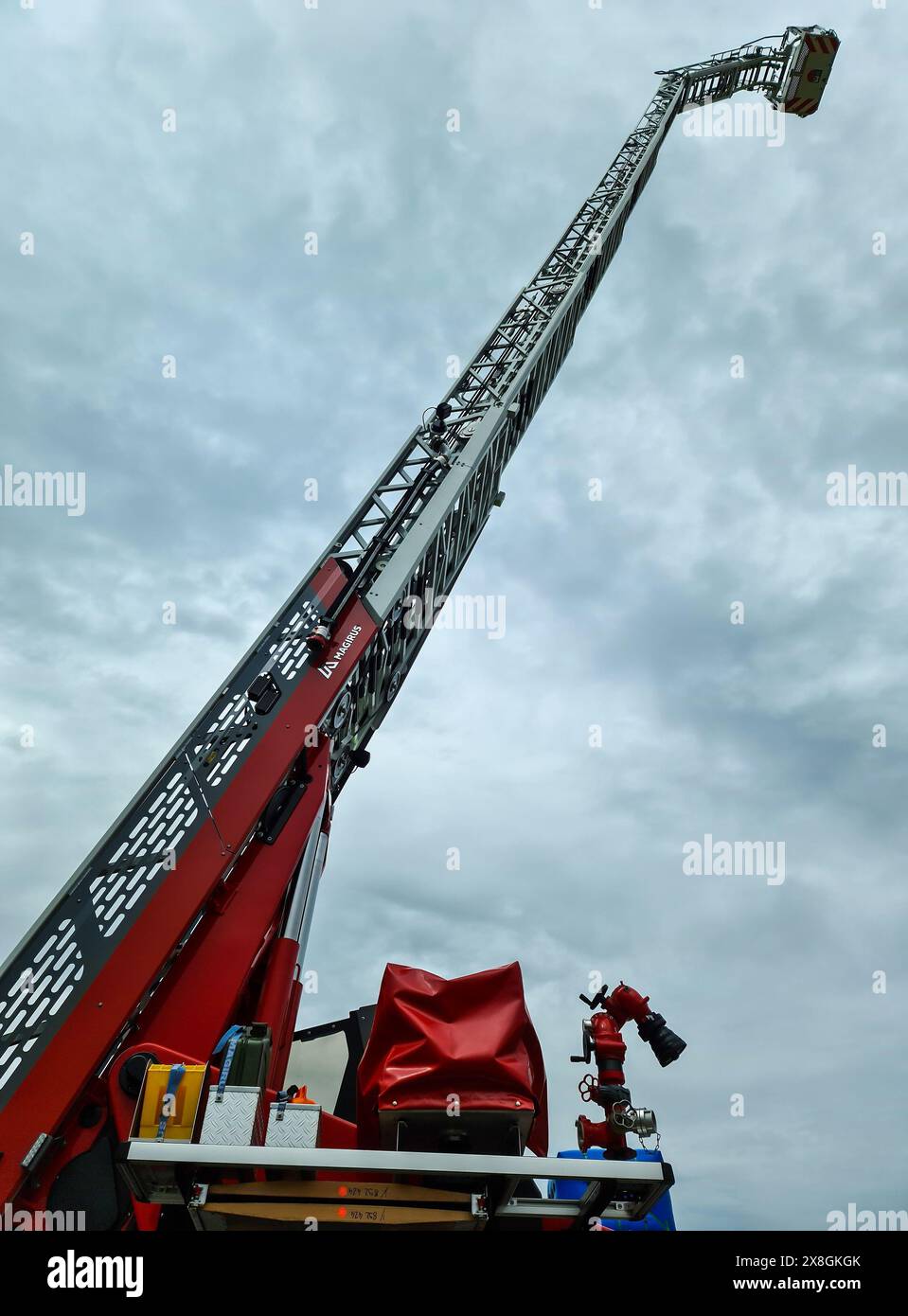 A very long extended ladder for rescuing people on a fire engine Stock ...