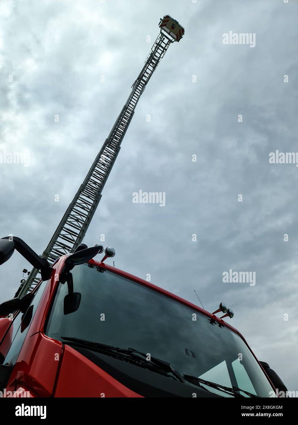 A very long extended ladder for rescuing people on a fire engine Stock ...