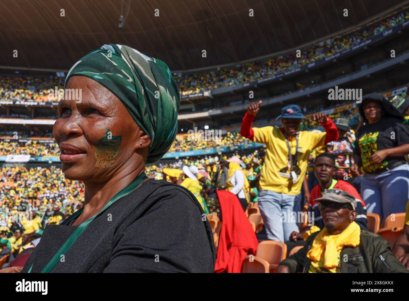 Fans and supporters chant and wave flags during the final African ...