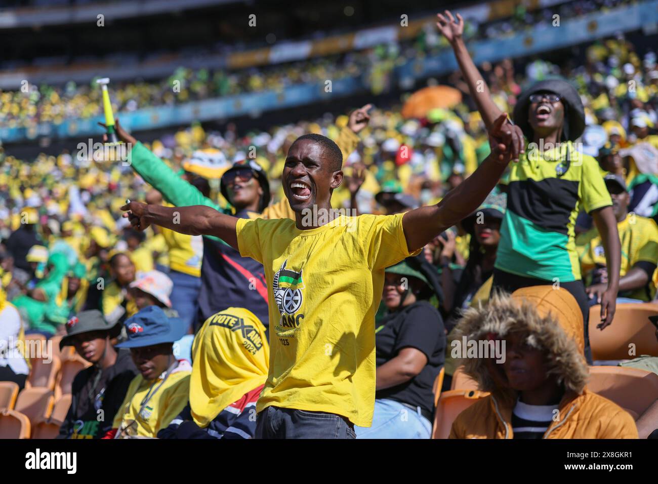 Fans and supporters chant and wave flags during the final African ...