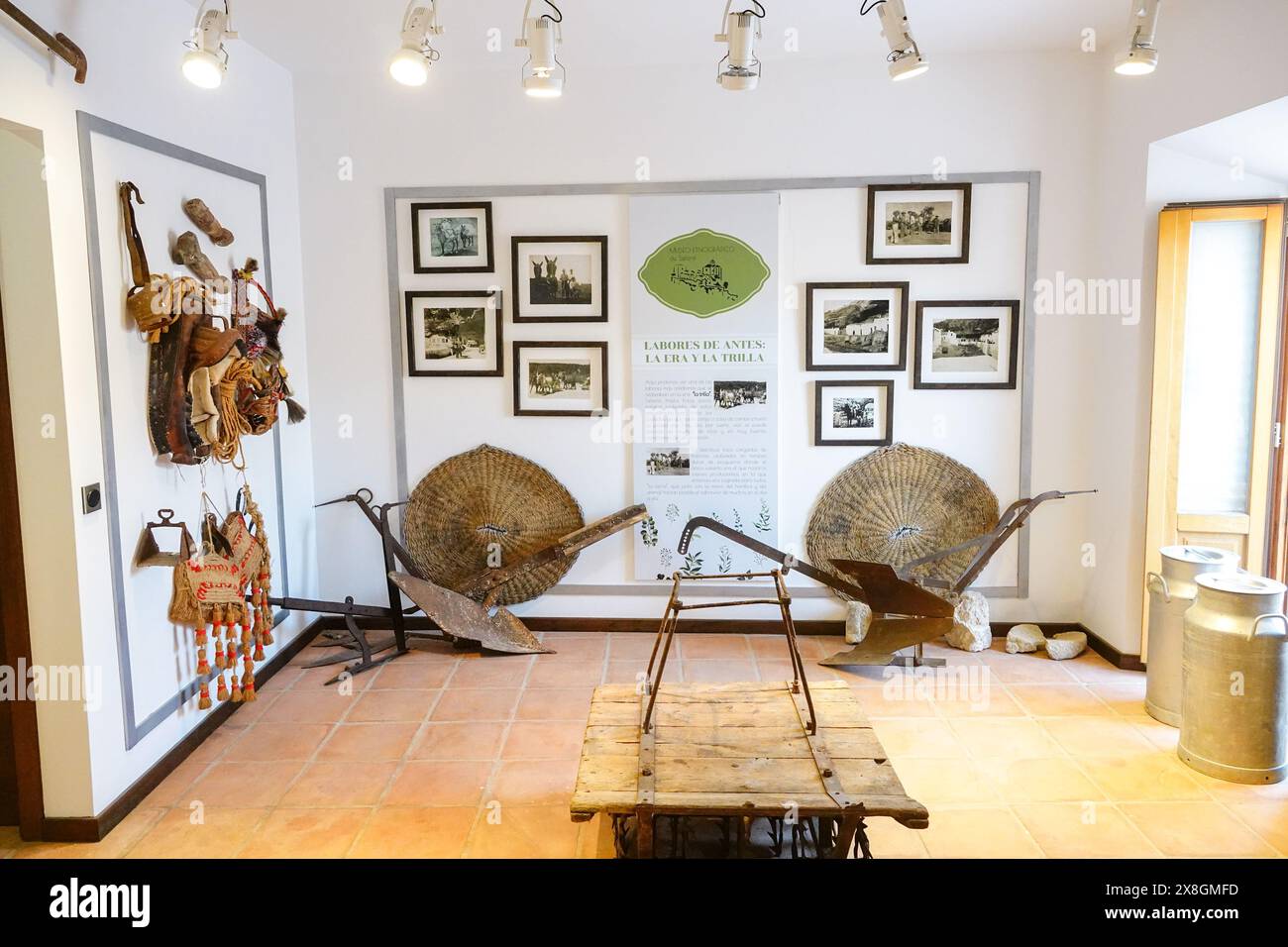 An exhibition of ancient agricultural tools recovered from the cave ...