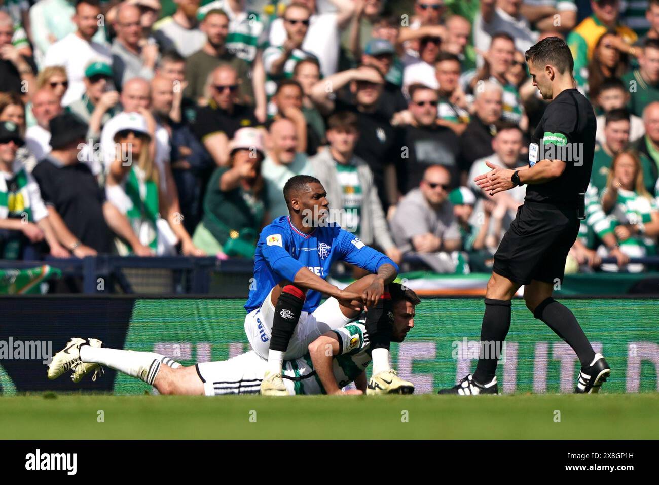 Rangers Dujon Sterling Sits On The Back Of Celtics Greg Taylor Bottom During The Scottish