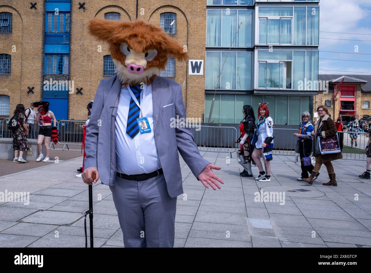 London, UK, 25th May, 2024. A furry poses outside the venue on day two ...