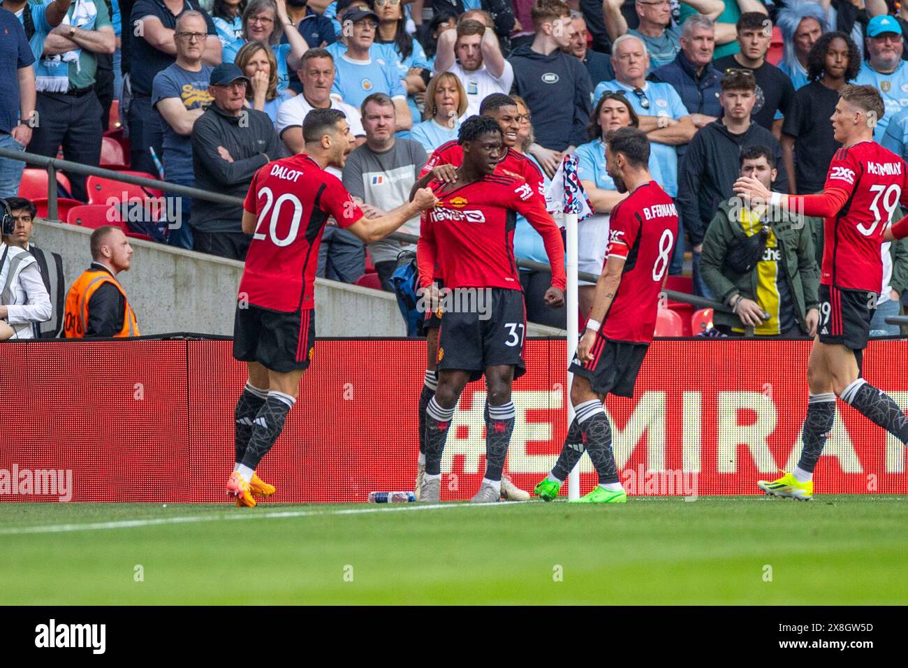 Kobbie Mainoo #37 of Manchester United celebrates his goal during the ...