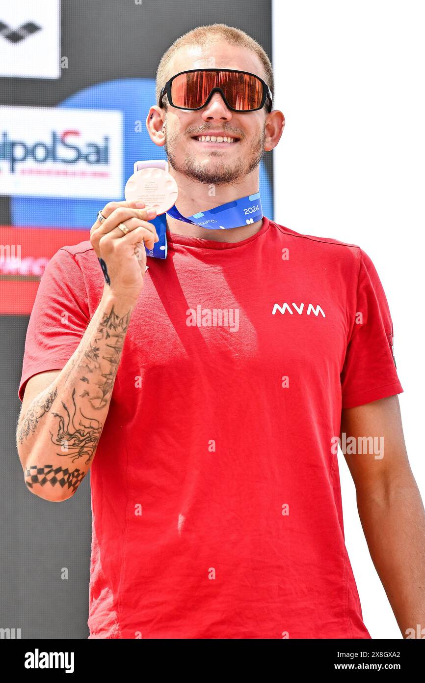 Kristóf Rasovszky of Hungary shows the bronze medal after the Men's 10 ...