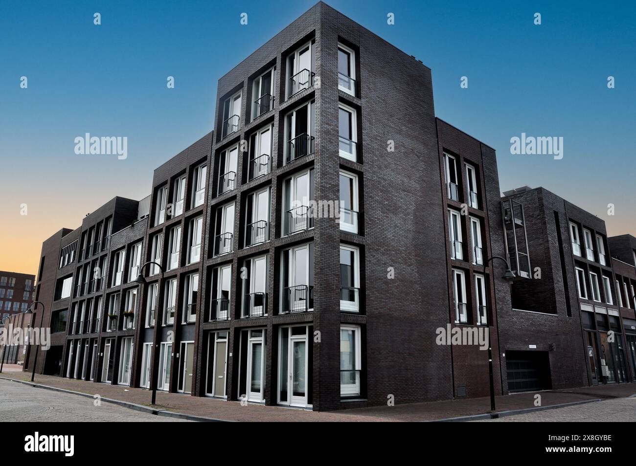 Original and modern flat block in the city of Delft Stock Photo - Alamy