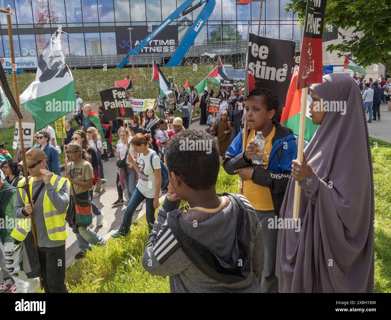 London, UK. 25 May.A large crowd marched slowly from the Greenwich ...
