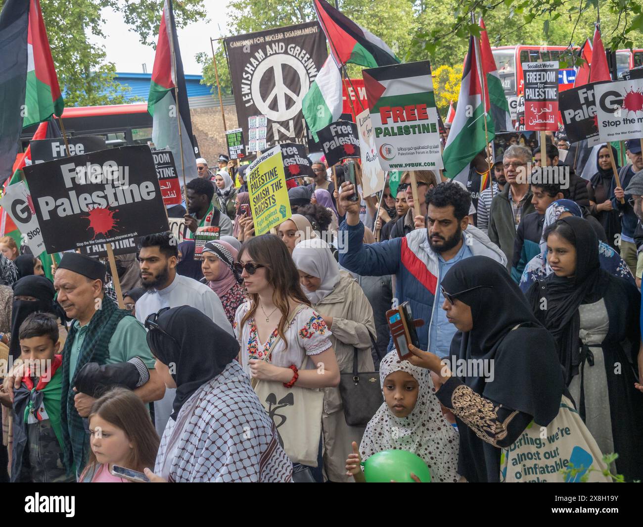London, UK. 25 May.A large crowd marched slowly from the Greenwich ...