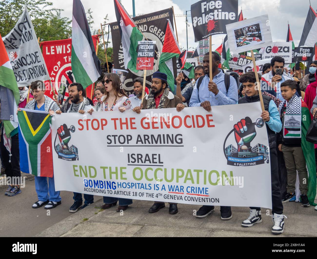 London, UK. 25 May.A large crowd marched slowly from the Greenwich ...