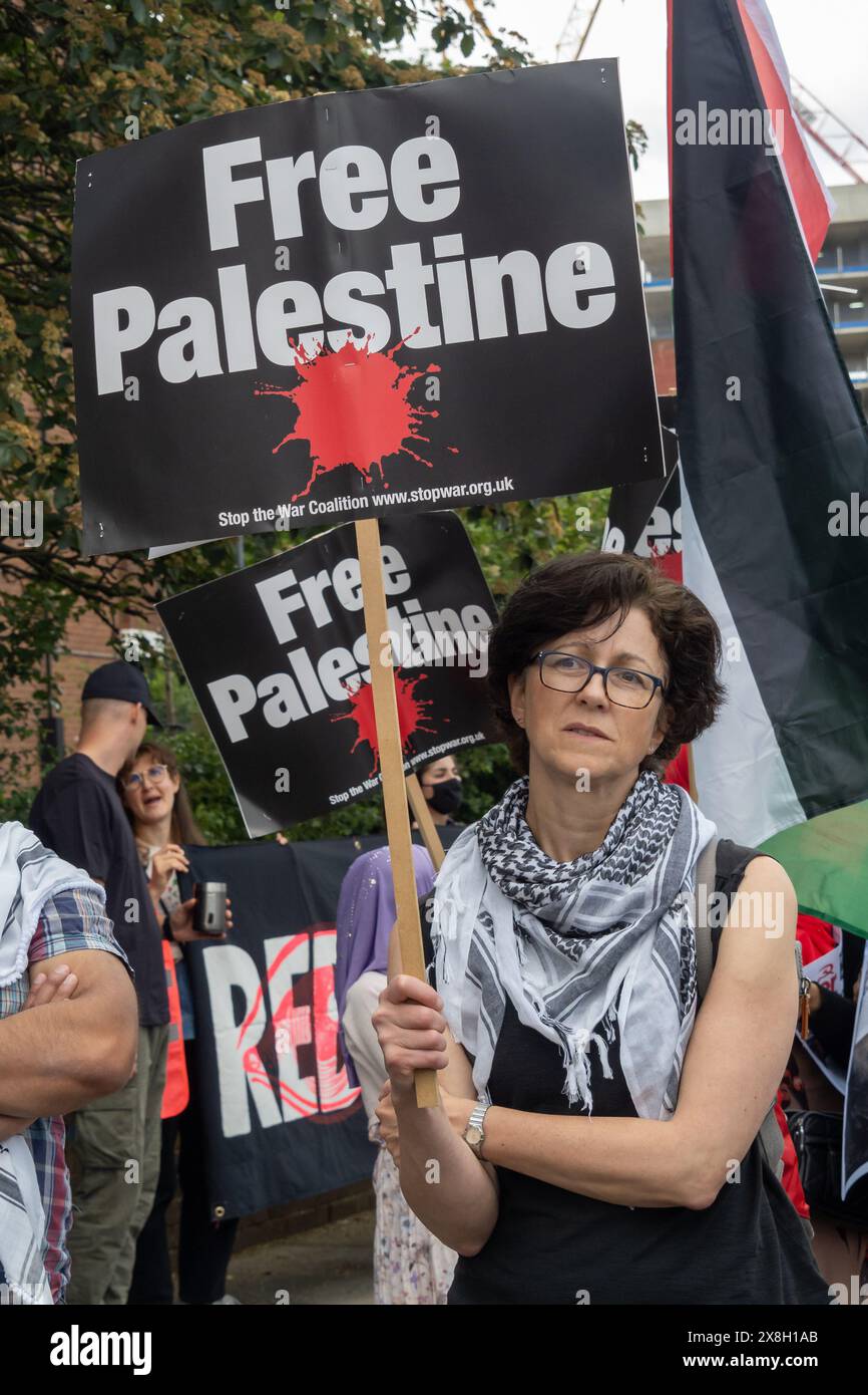 London, UK. 25 May.A large crowd marched slowly from the Greenwich ...