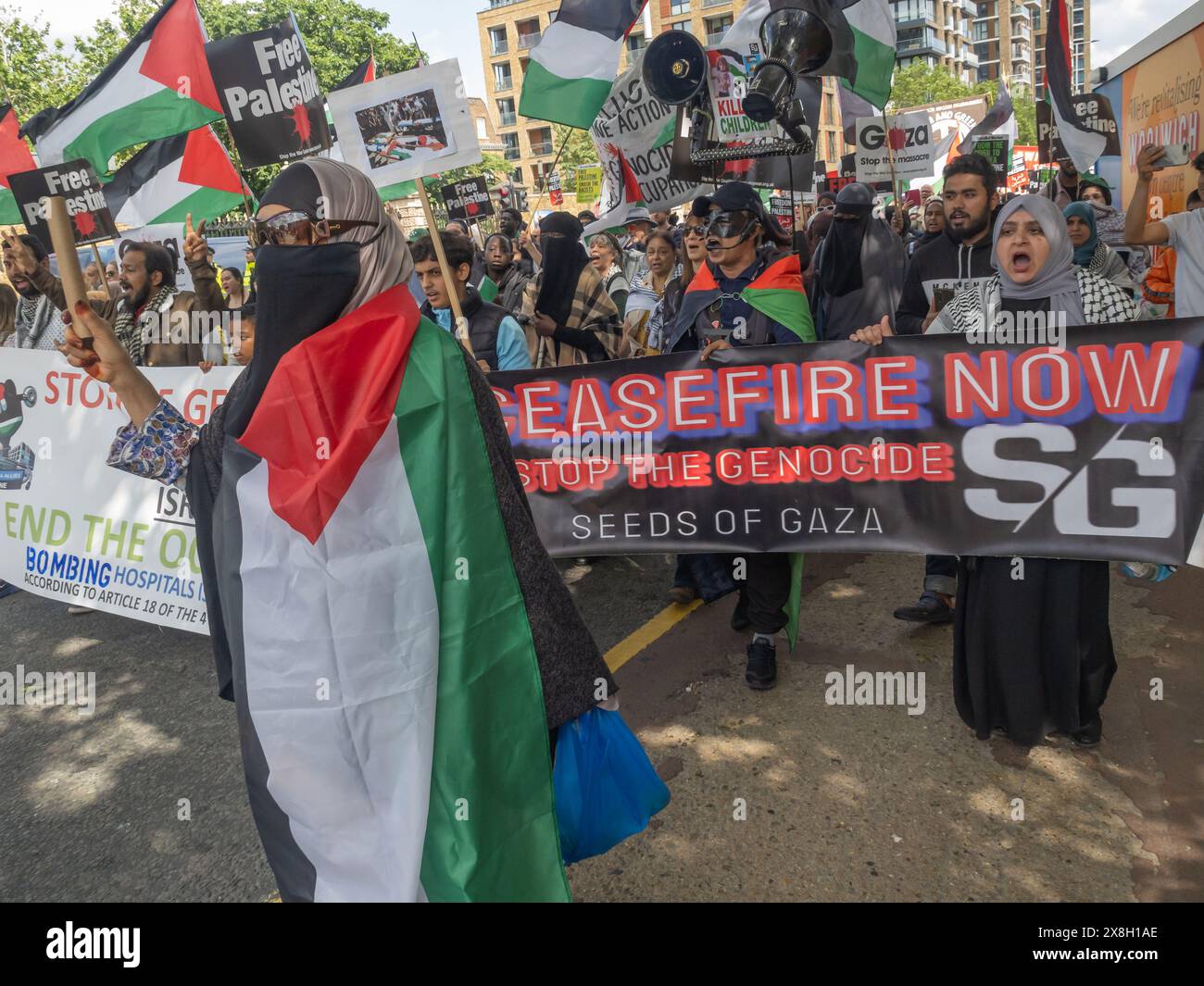 London, UK. 25 May.A large crowd marched slowly from the Greenwich ...