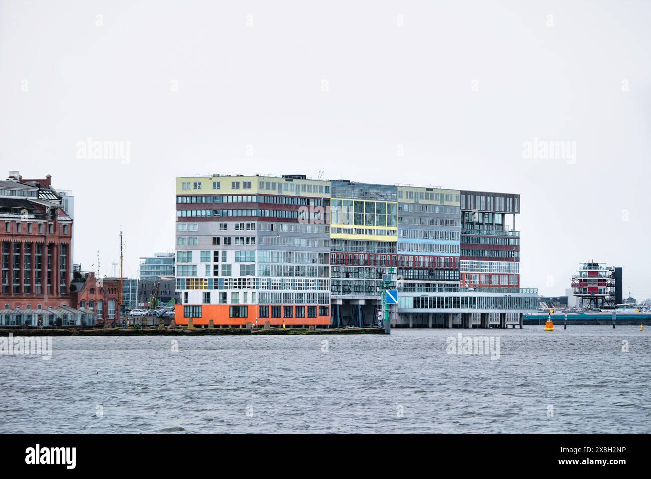 Netherlands, Amsterdam - April 6, 2024: Modern social housing apartment ...