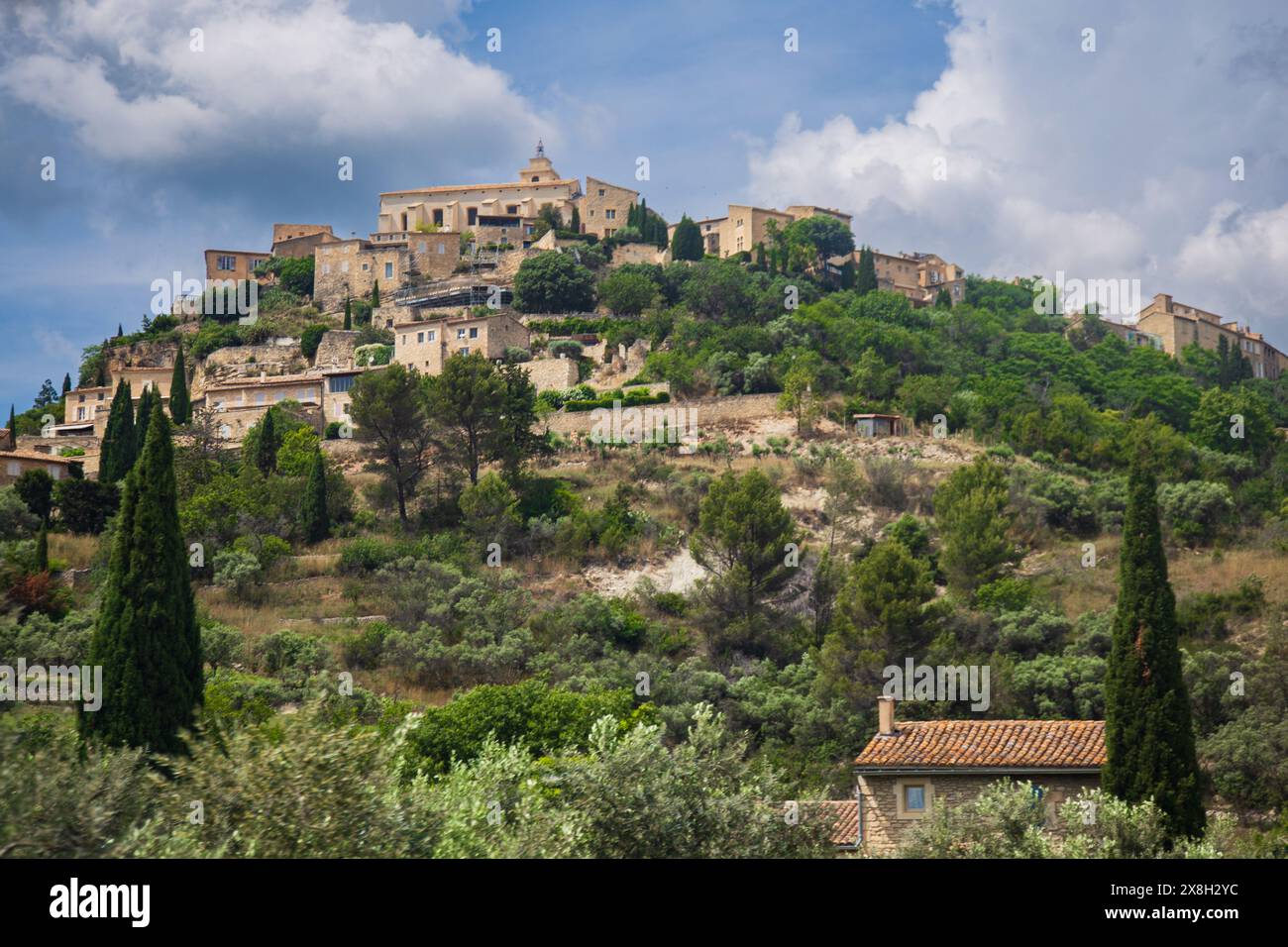 A view of a medieval place in France. There is Gordes city, travels in ...