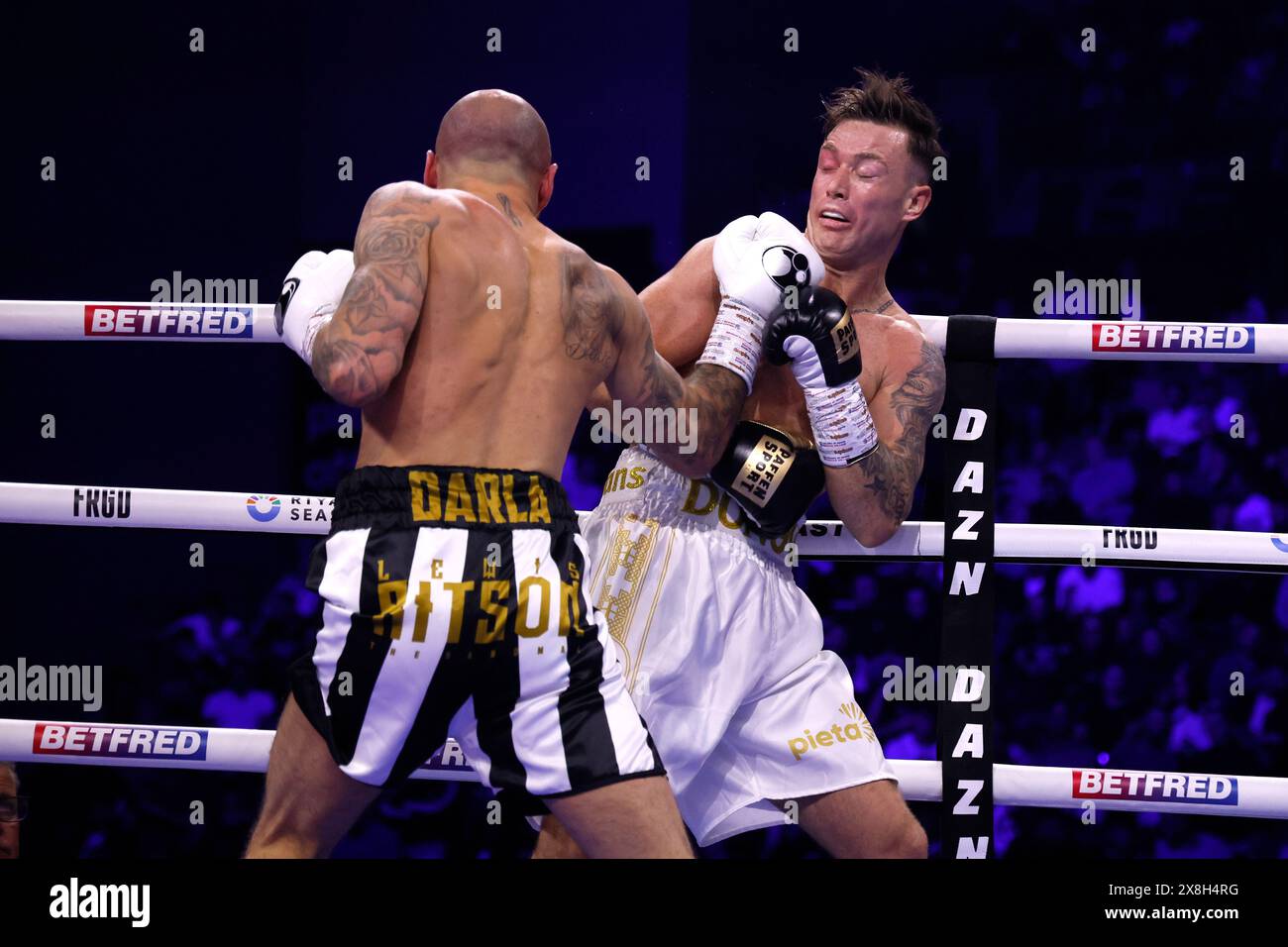 Lewis Ritson (left) in action against Paddy Donovan in the welter ...