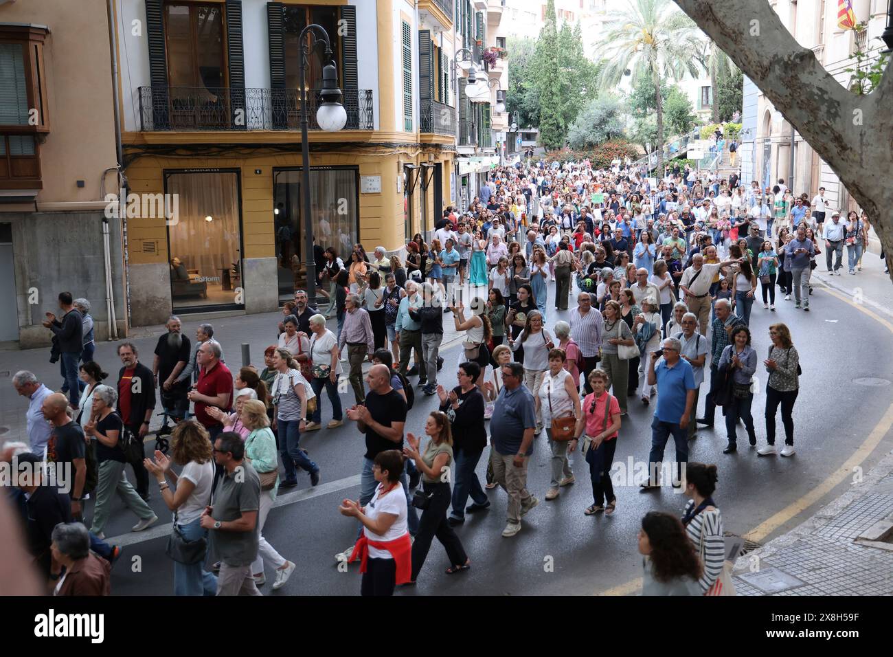 Hundreds of people during a demonstration against tourist overcrowding and for decent housing ...