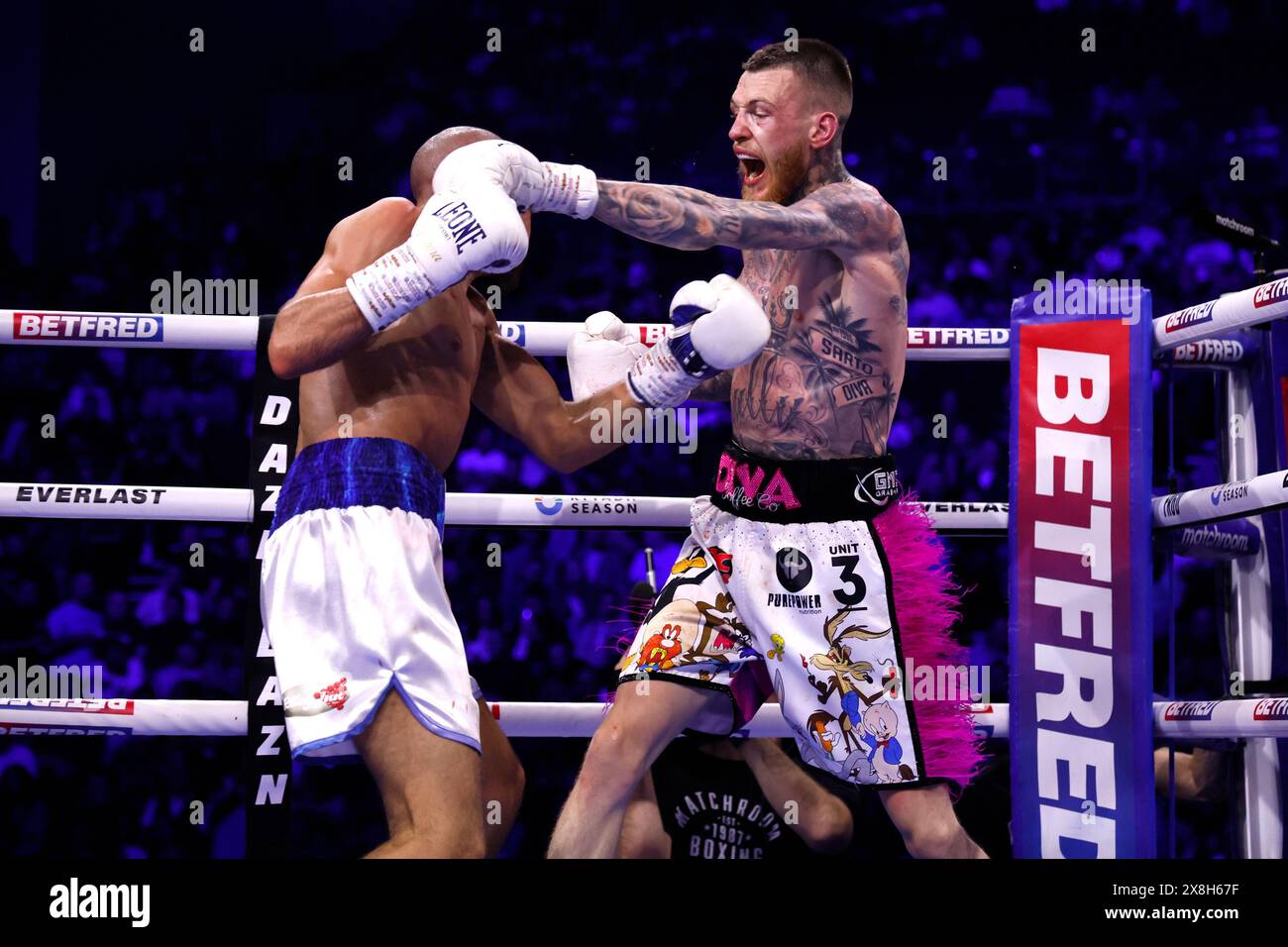 Gary Cully (right) in action against Francesco Patera in the light bout ...