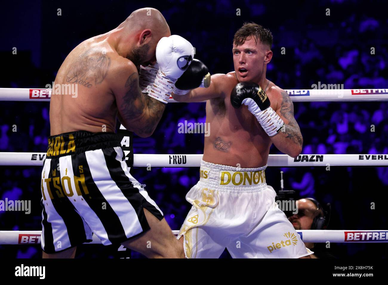 Paddy Donovan (right) in action against Lewis Ritson in the welter ...